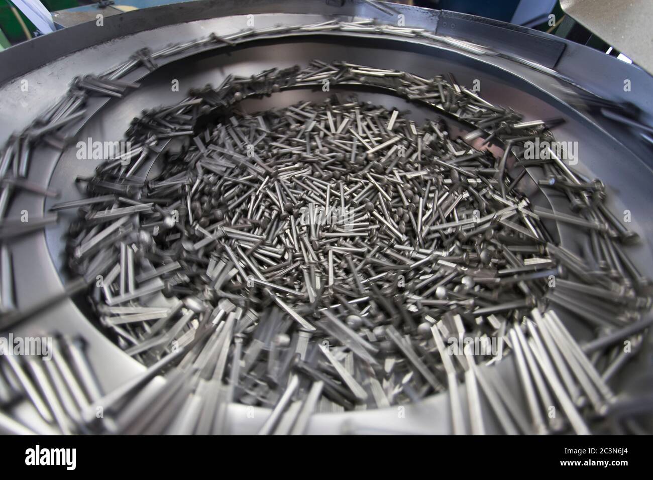 Detail of industrial machinery inside a production line facility plant ...