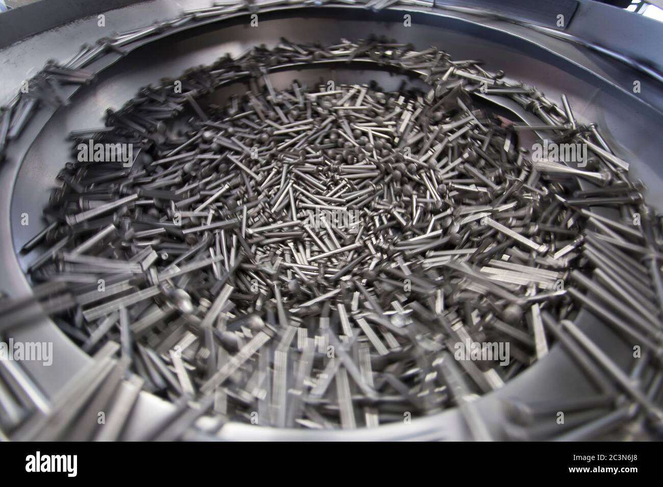 Detail of industrial machinery inside a production line facility plant ...