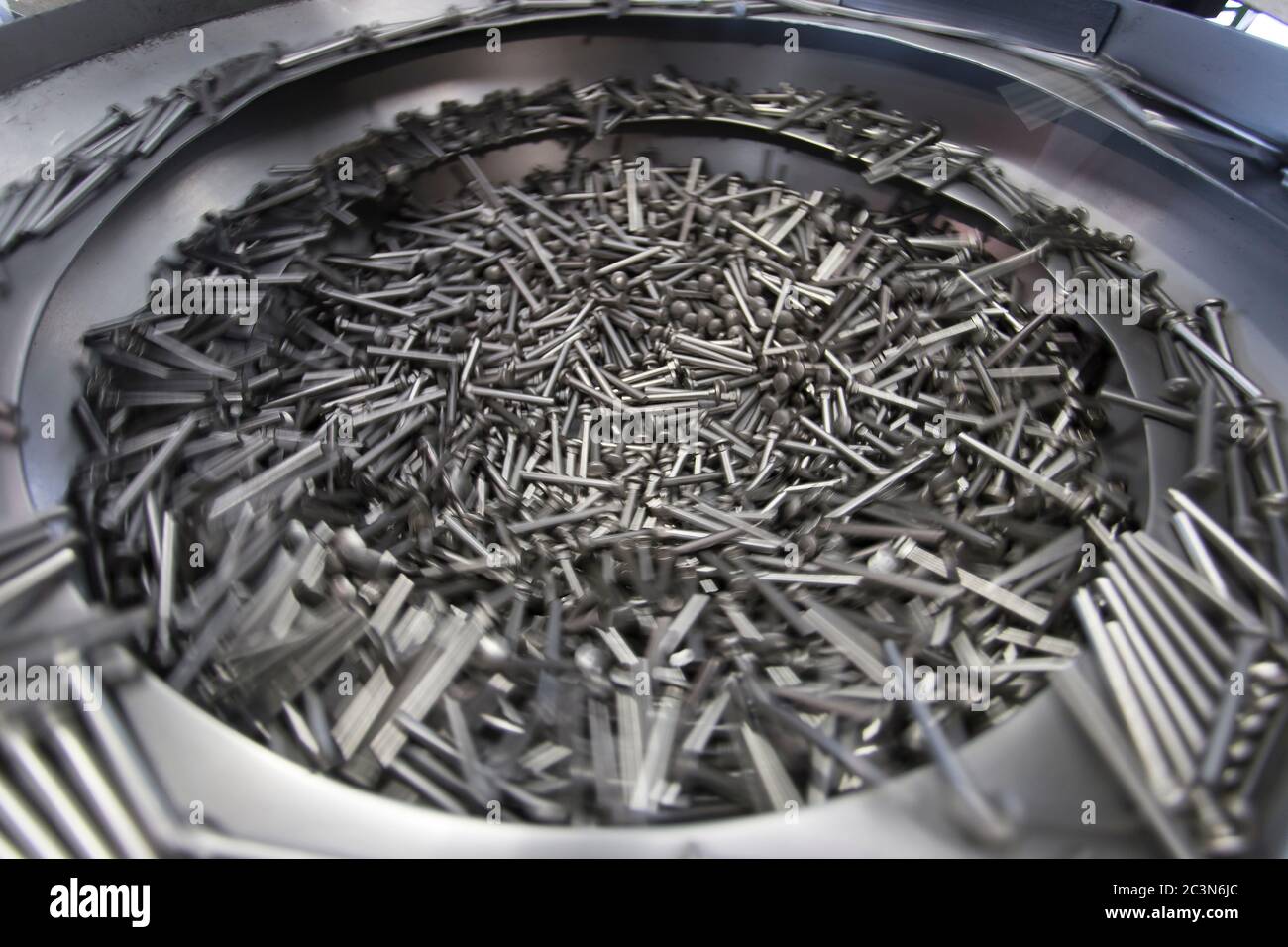 Detail of industrial machinery inside a production line facility plant ...
