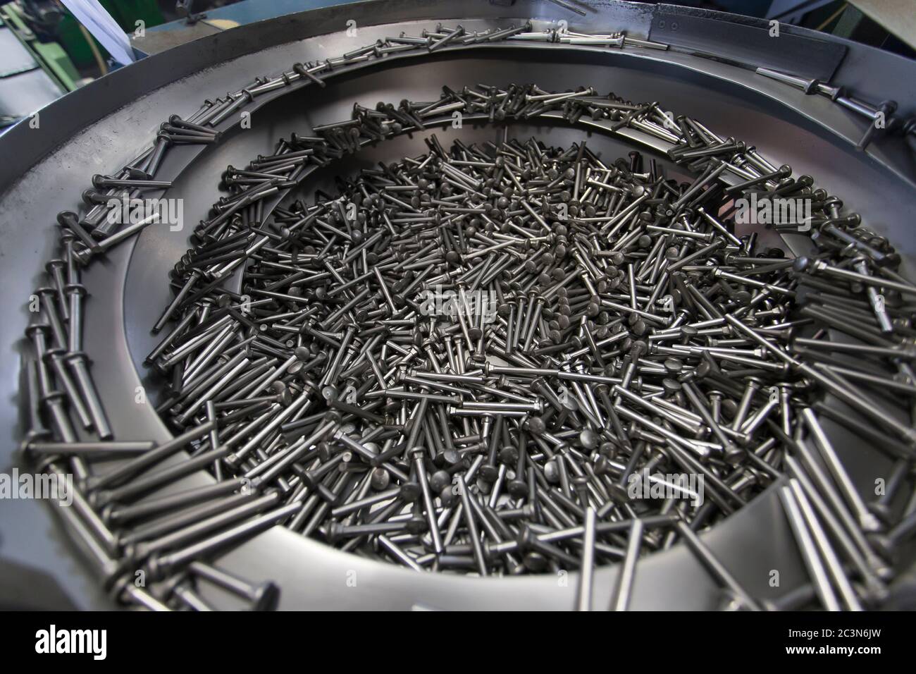 Detail of industrial machinery inside a production line facility plant ...