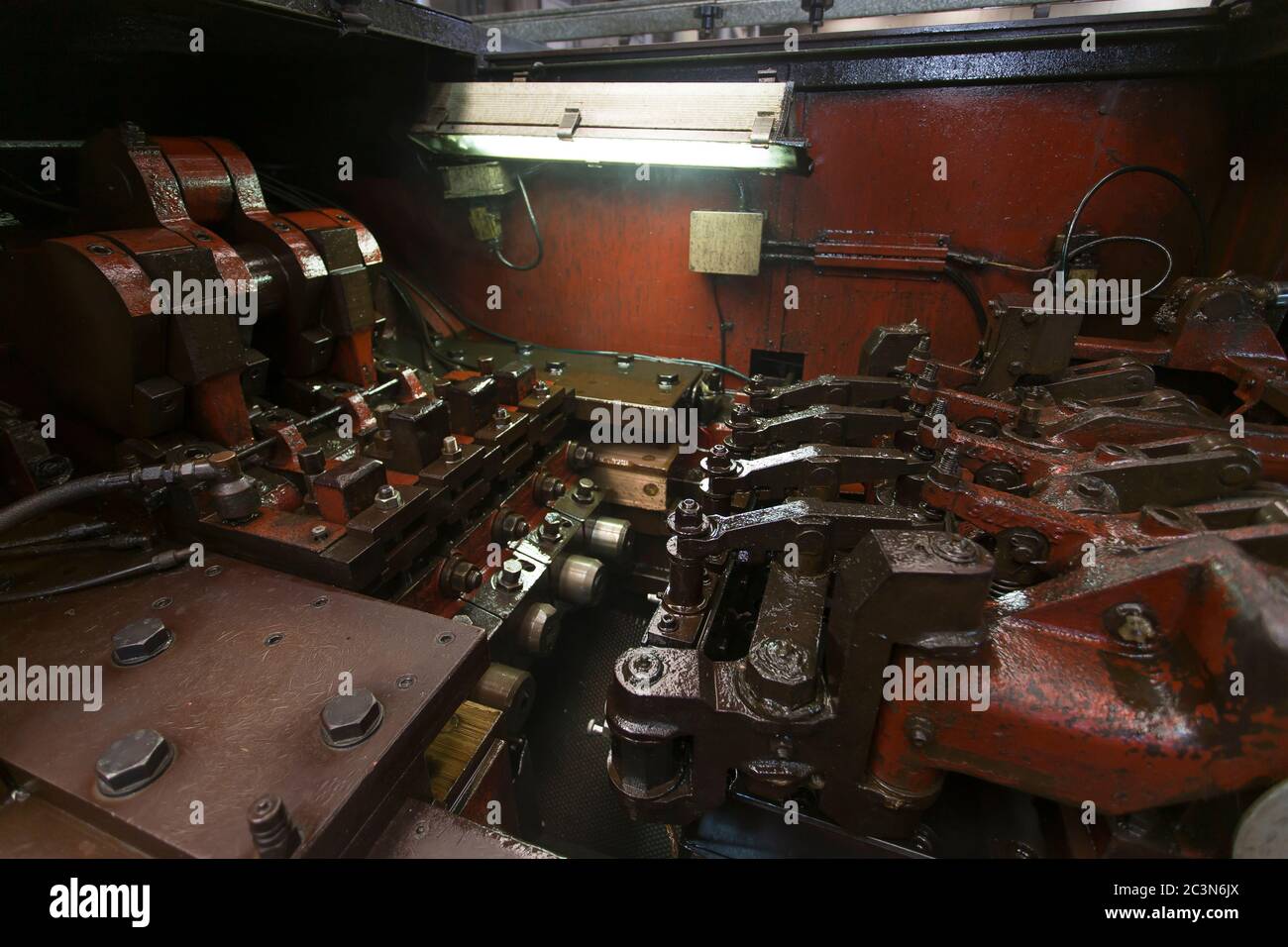 Detail of industrial machinery inside a production line facility plant ...