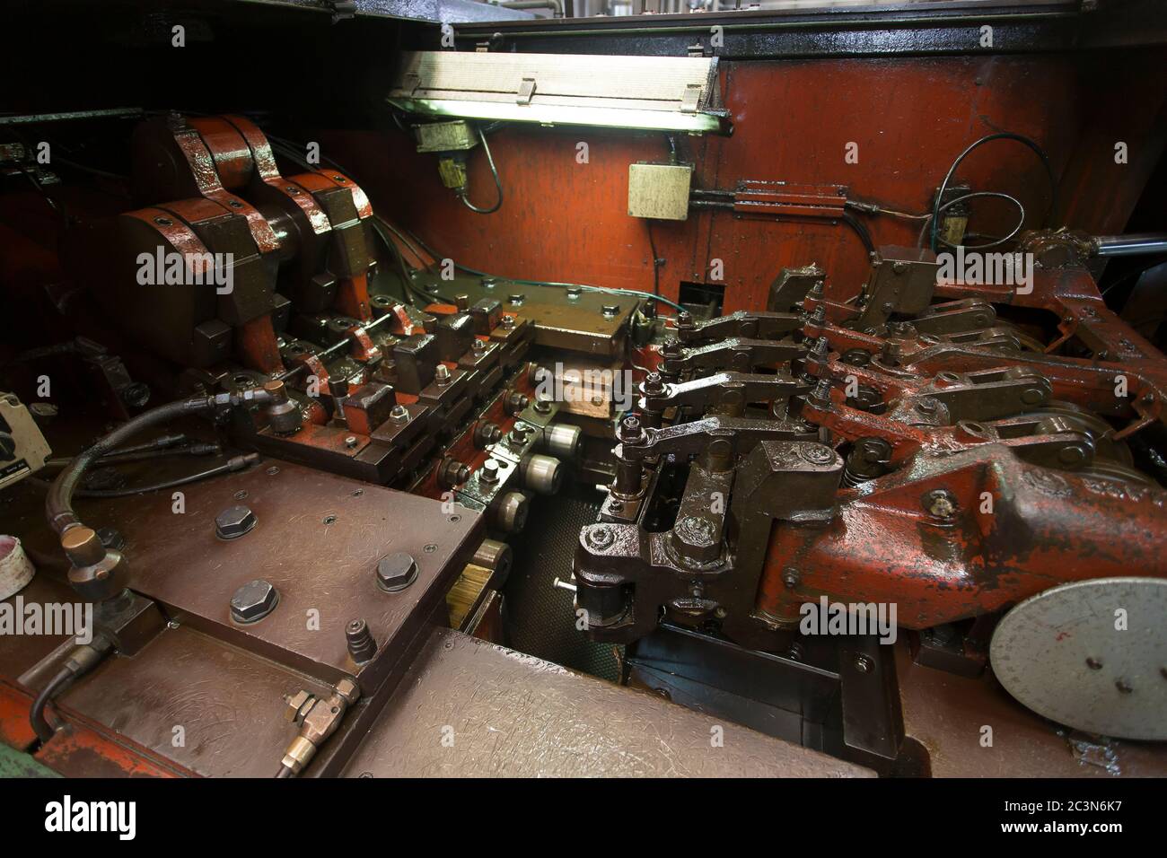 Detail of industrial machinery inside a production line facility plant ...