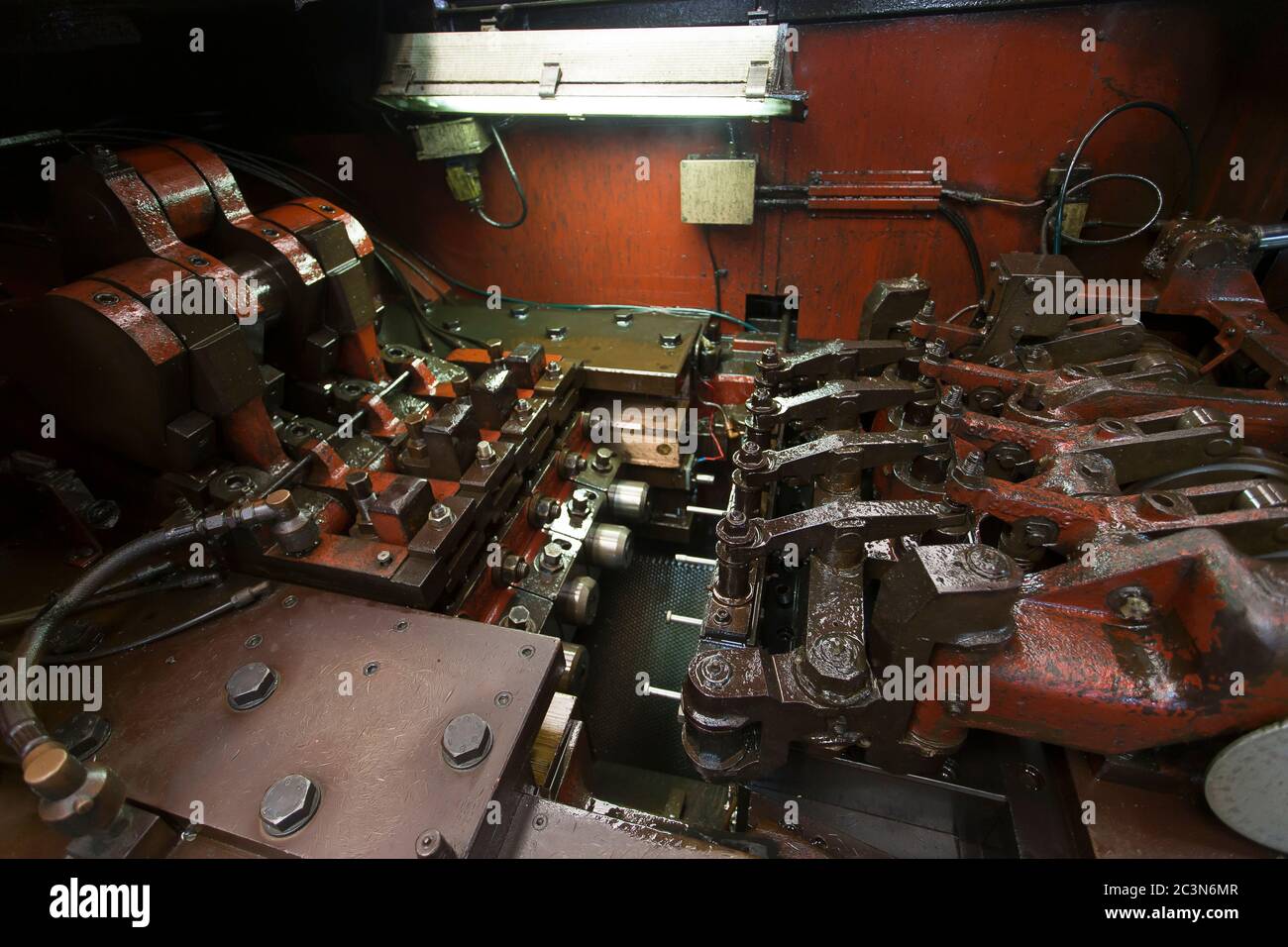 Detail of industrial machinery inside a production line facility plant ...
