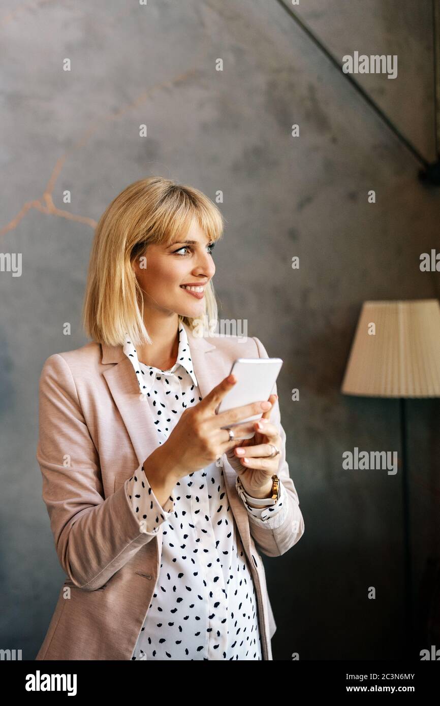Beautiful executive business woman, ceo, coworker at the workspace ...