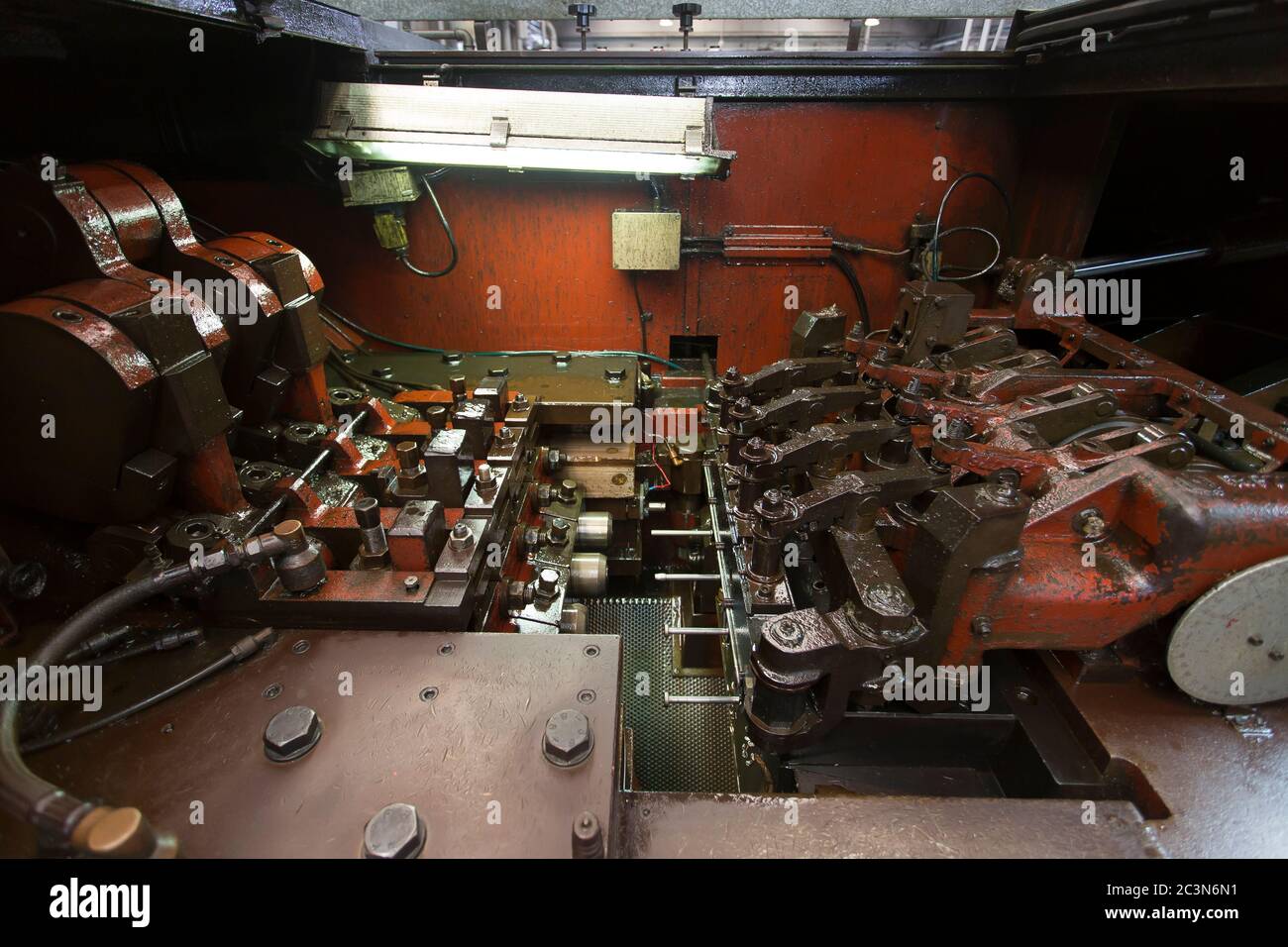 Detail of industrial machinery inside a production line facility plant ...