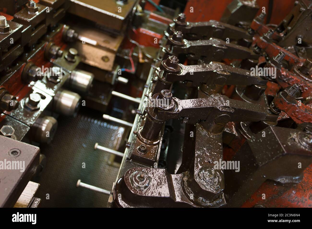 Detail of industrial machinery inside a production line facility plant ...