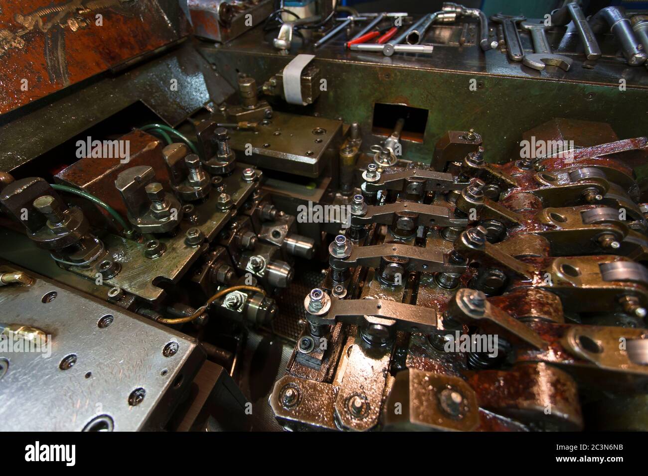 Detail of industrial machinery inside a production line facility plant ...