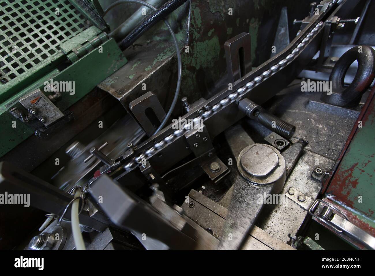 Detail of industrial machinery inside a production line facility plant ...
