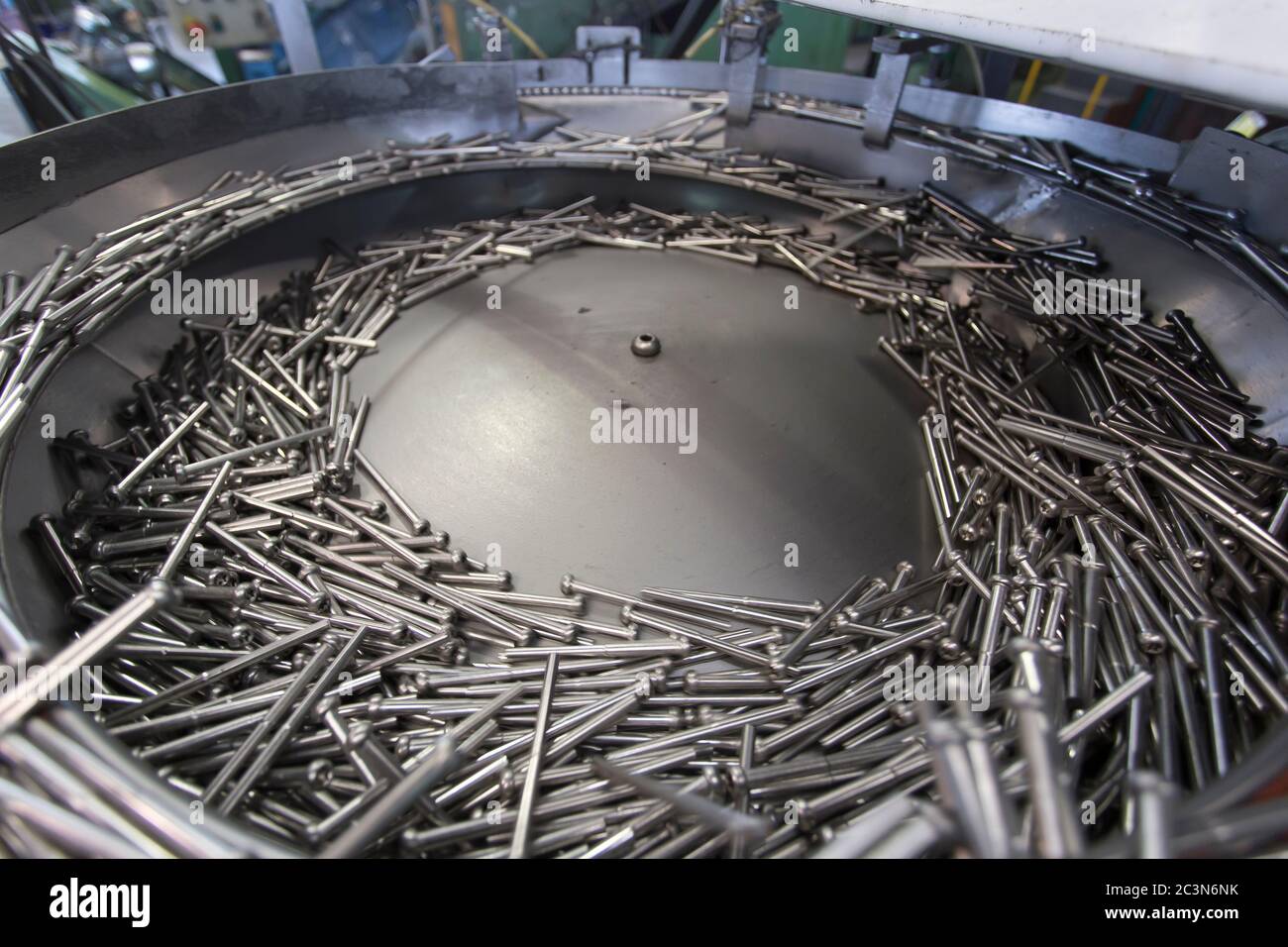 Detail of industrial machinery inside a production line facility plant ...