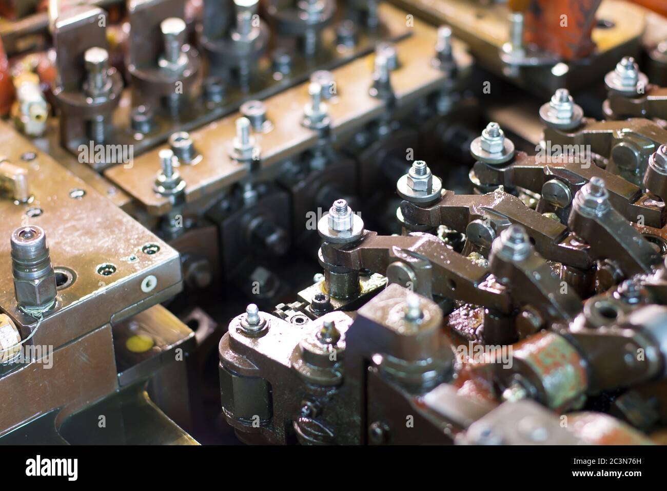 Detail of industrial machinery inside a production line facility plant ...