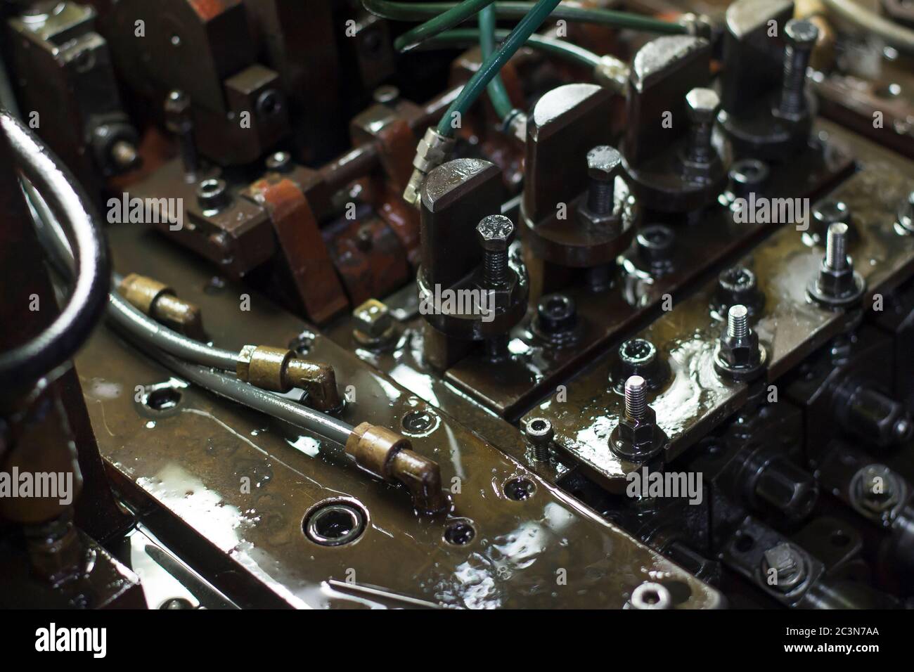 Detail of industrial machinery inside a production line facility plant ...