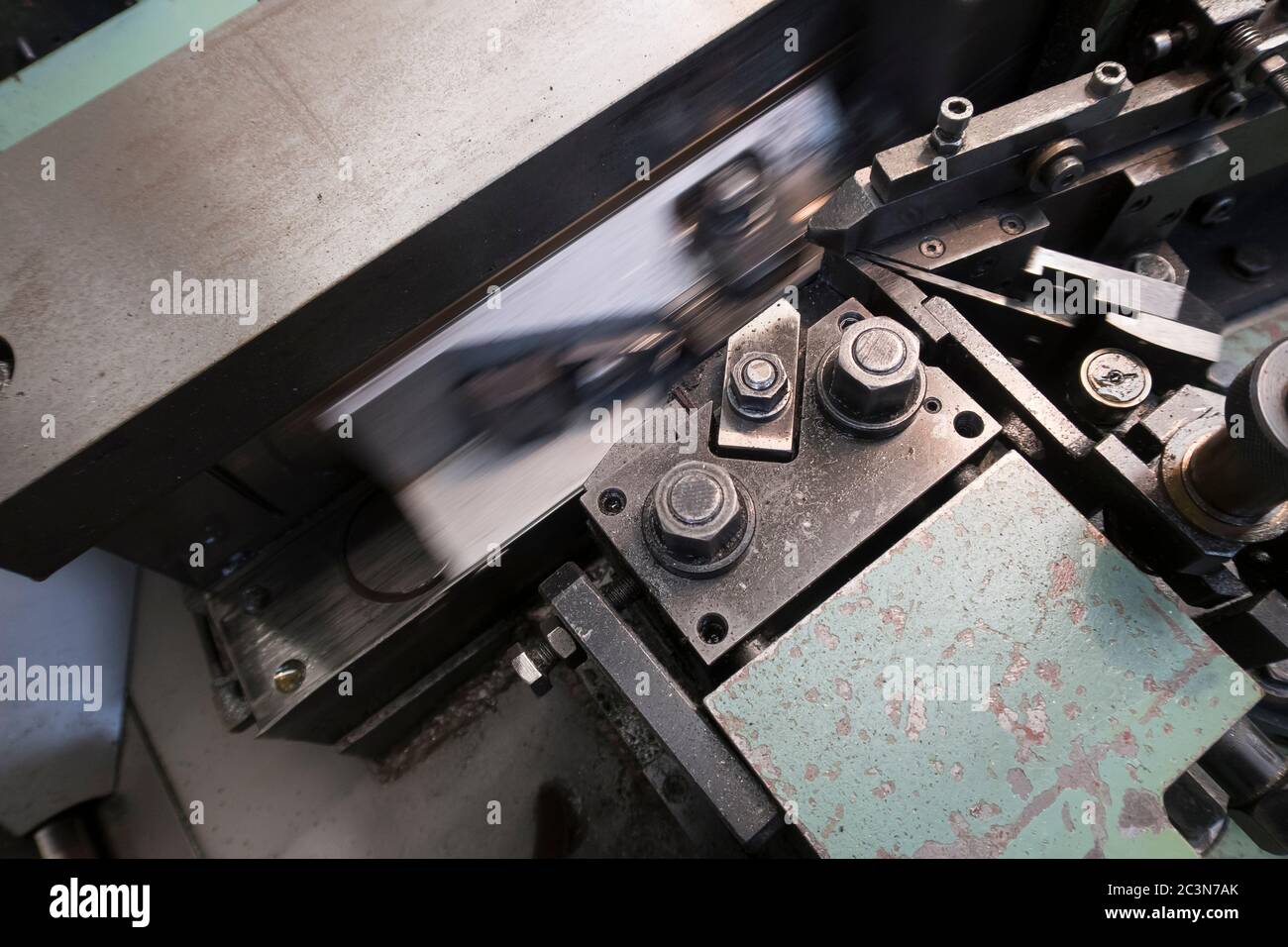 Detail of industrial machinery inside a production line facility plant ...