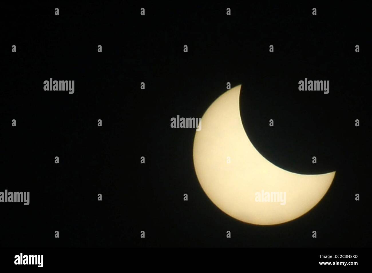 Lahore. 21st June, 2020. A partial solar eclipse is seen in eastern ...