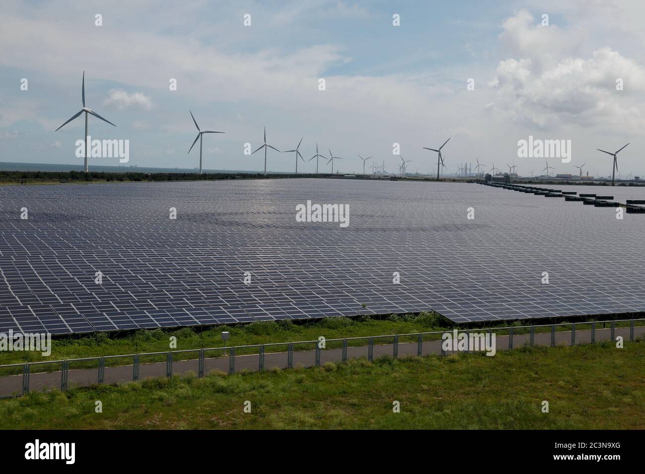 Windmill and solar power station Stock Photo - Alamy