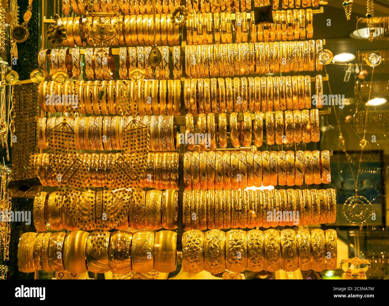 Rows of gold bracelets as a background in a jewelry store on the Grand ...
