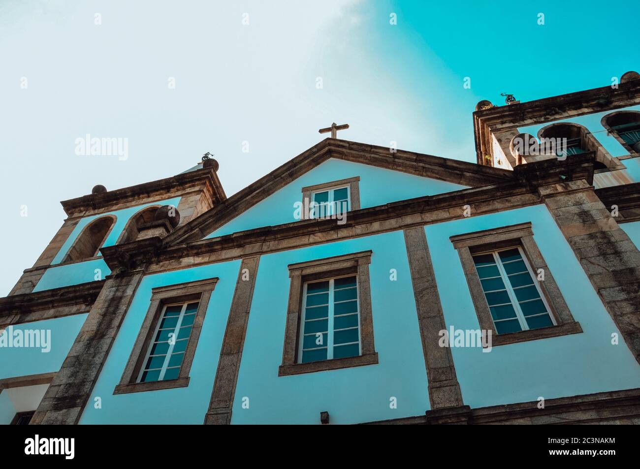 Church in Brazil with a cross on the roof against the blue sky Stock ...
