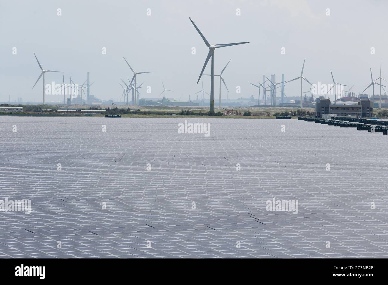Windmill and solar power station Stock Photo - Alamy