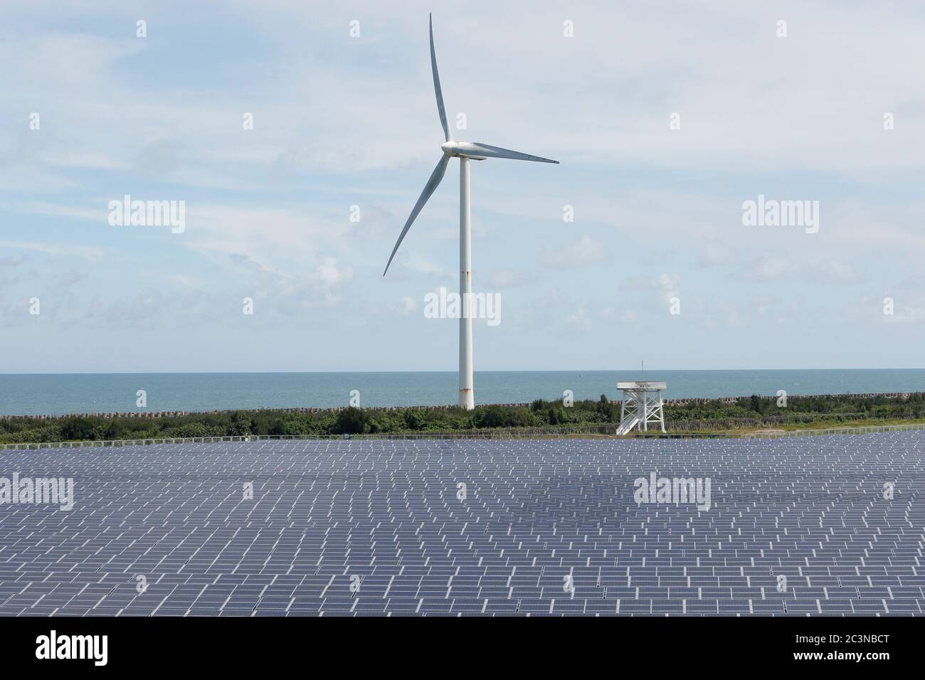 Windmill and solar power station Stock Photo - Alamy
