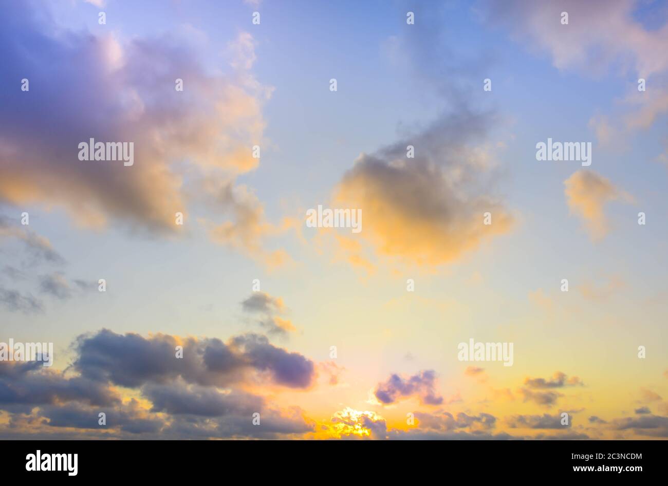Beautiful sunset with clouds Stock Photo - Alamy