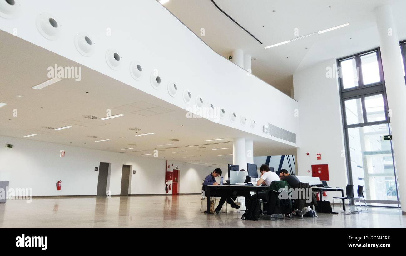 People working on computers in a large office Stock Photo - Alamy