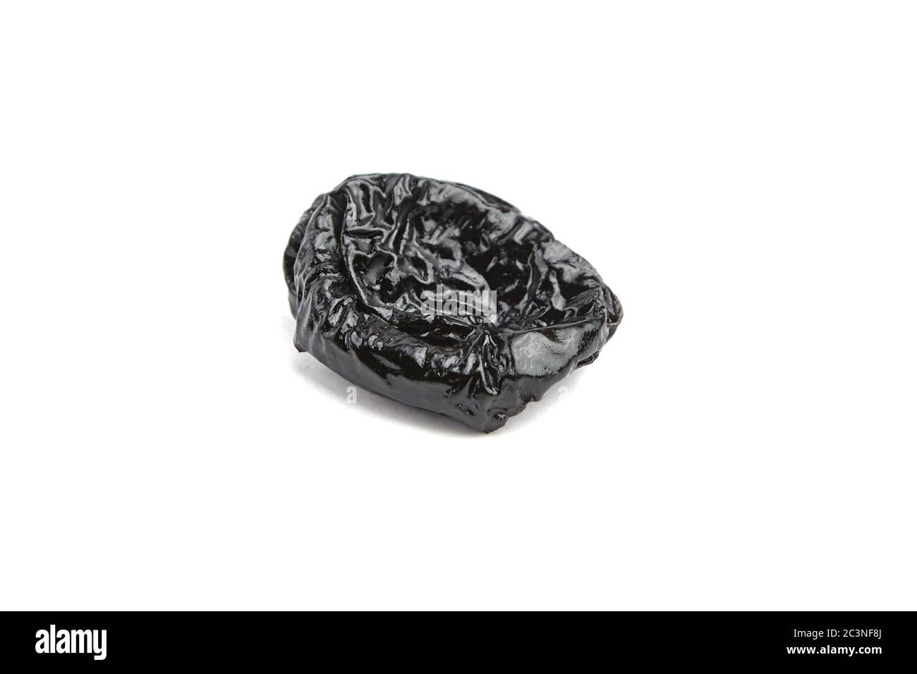 Prune, single dry plum isolated on white background. Dried fruit Stock ...