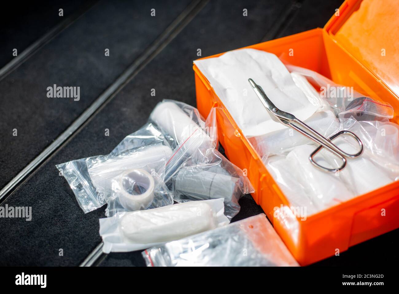 Close up of car first aid kit, mandatory car equipment, saving lives in ...