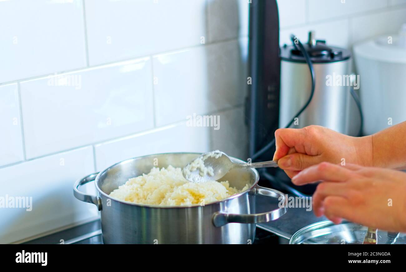 Spoon in handle of pot hi-res stock photography and images - Alamy
