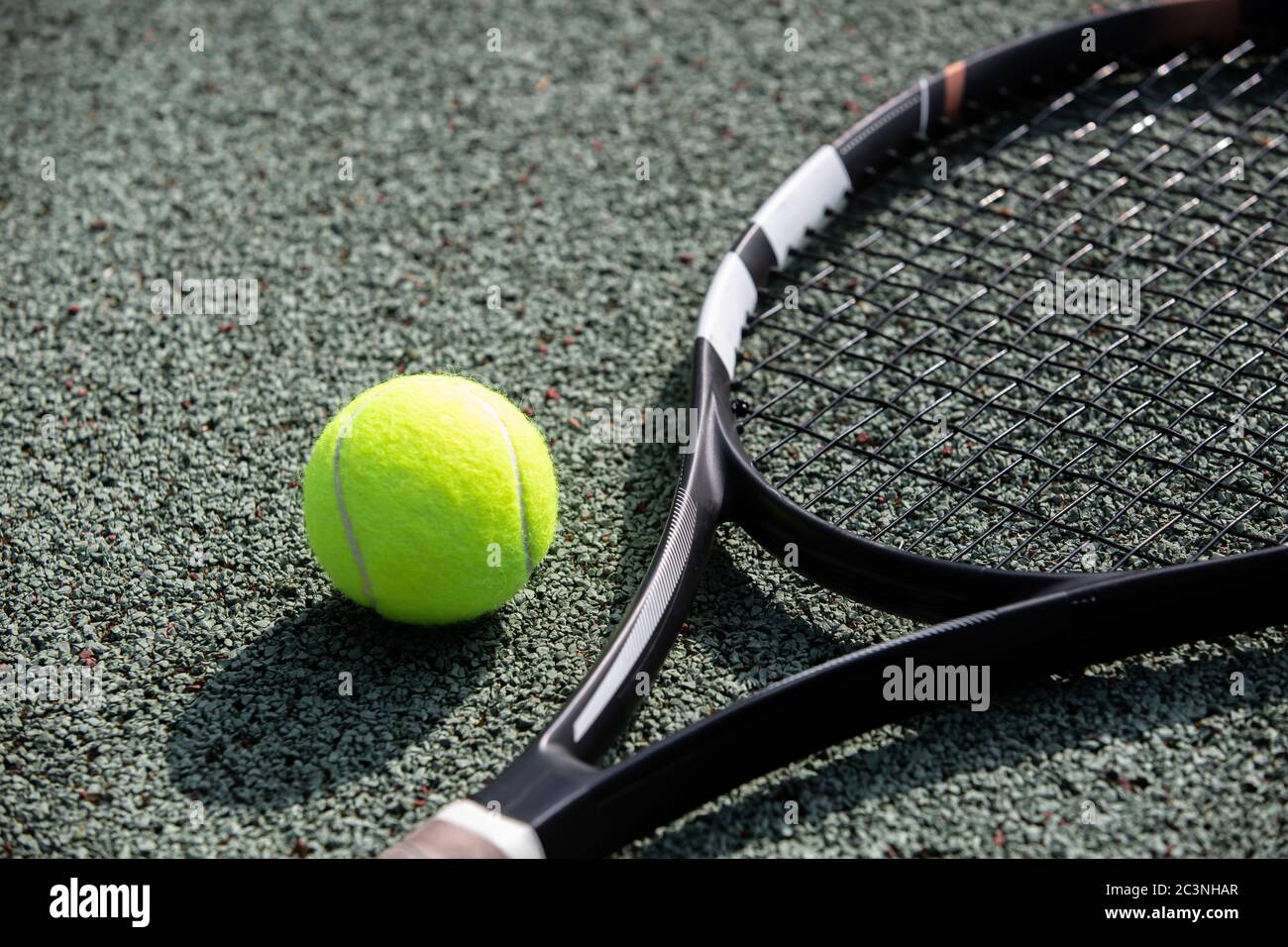 Tennis racket and ball on professional tennis court, sport concept ...