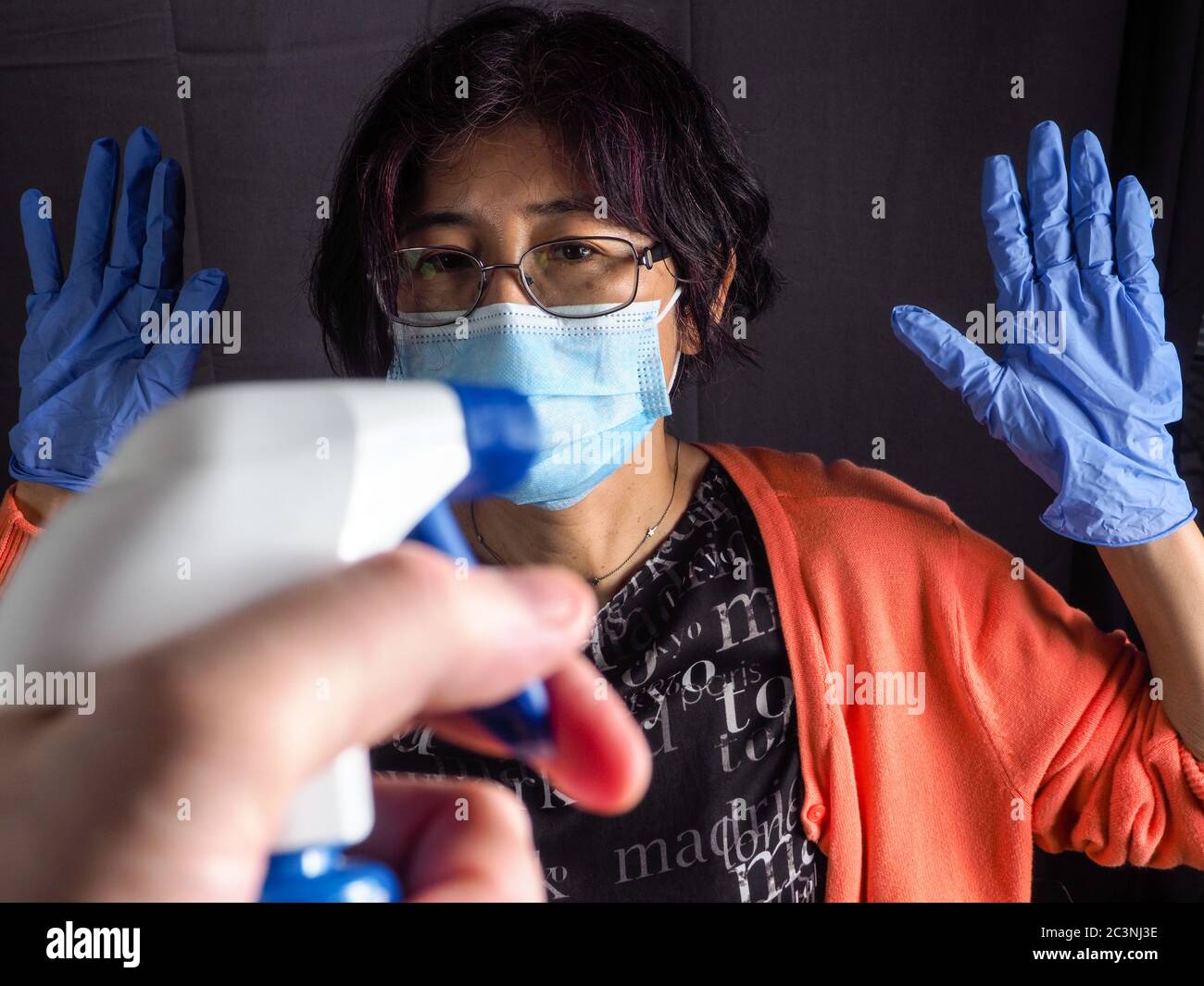 funny humorous adult asian 40s 50s woman wearing protection surgical ...