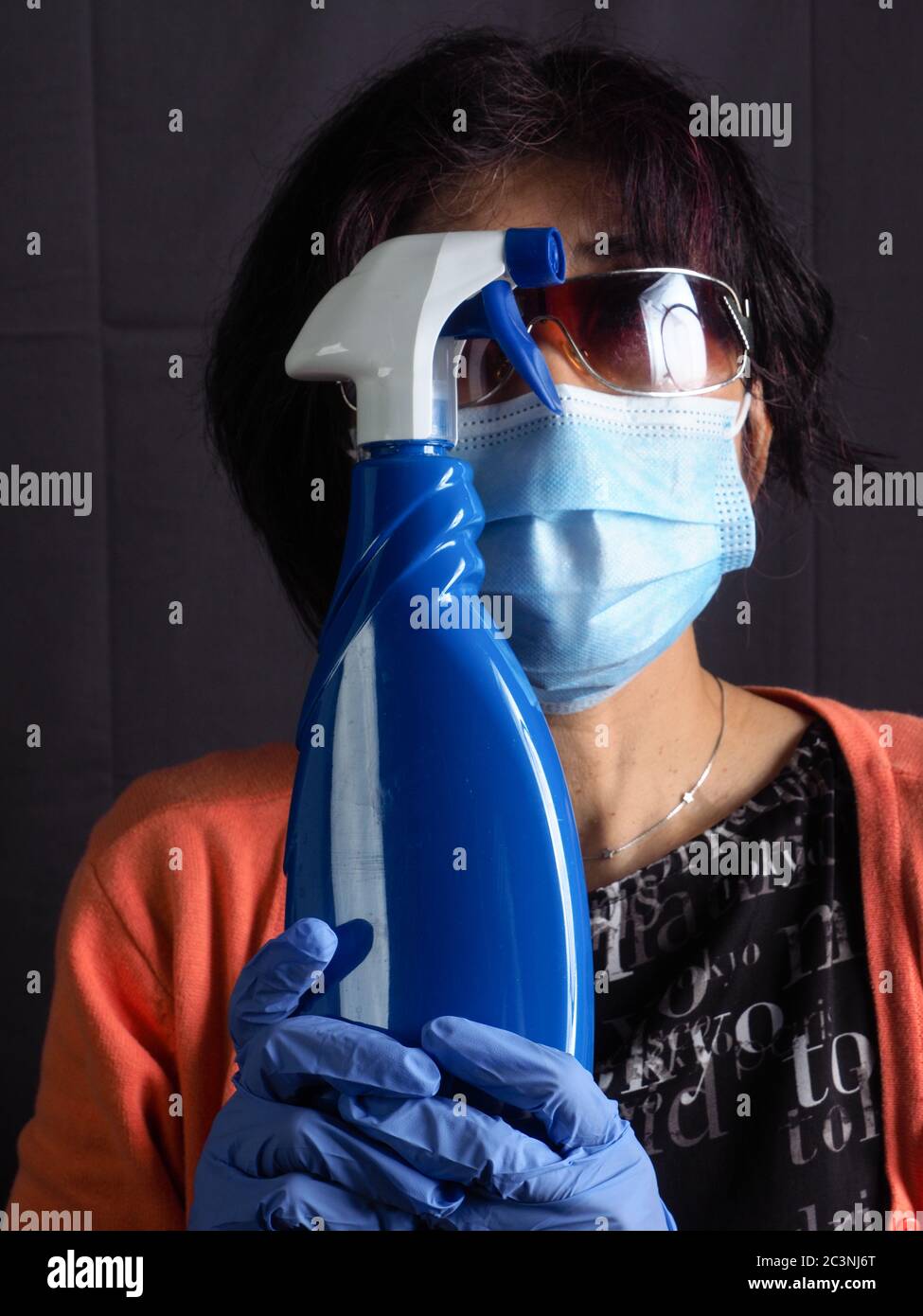 funny humorous adult asian 40s 50s woman wearing protection surgical ...