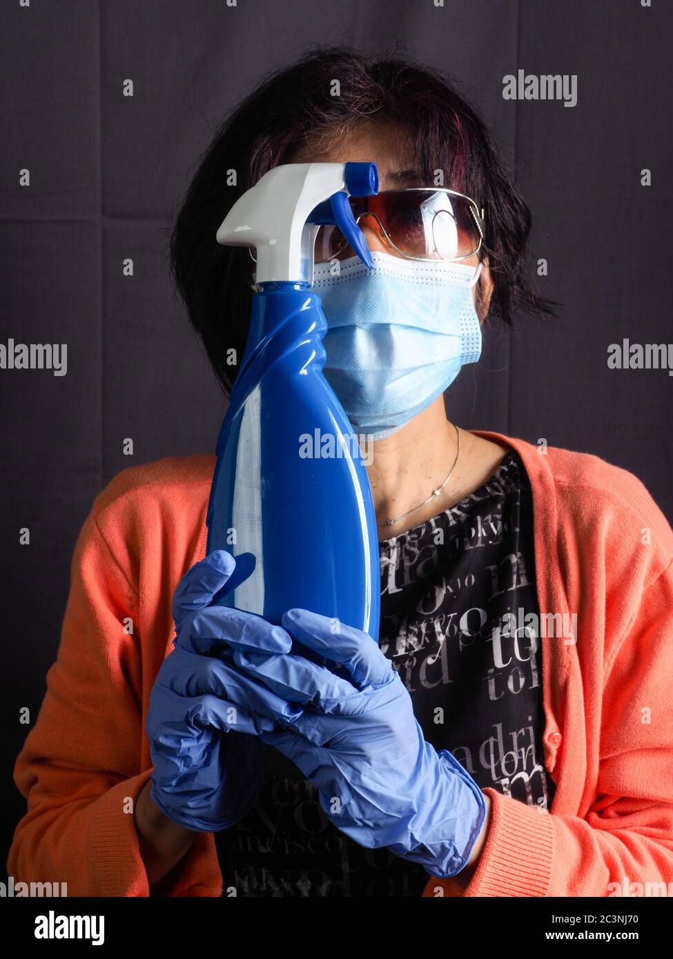 funny humorous adult asian 40s 50s woman wearing protection surgical ...