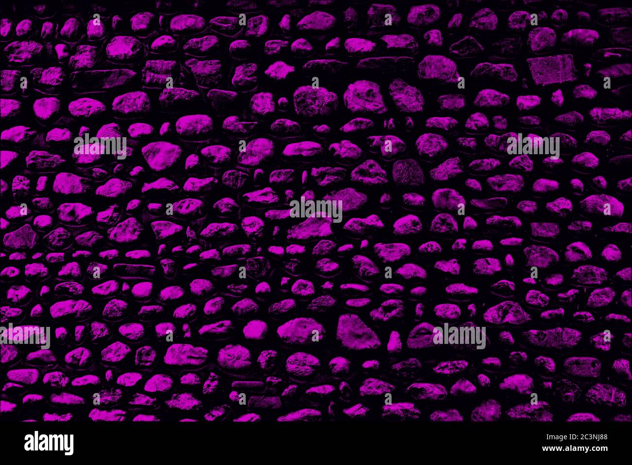 Texture of a stone wall in purple-wallpaper Stock Photo - Alamy