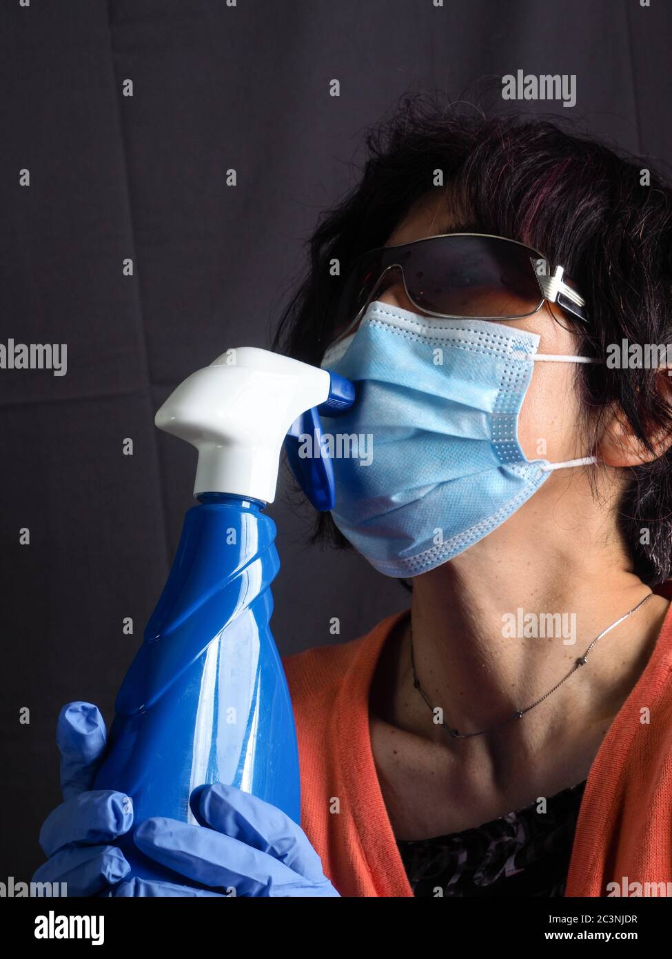 funny humorous adult asian 40s 50s woman wearing protection surgical ...