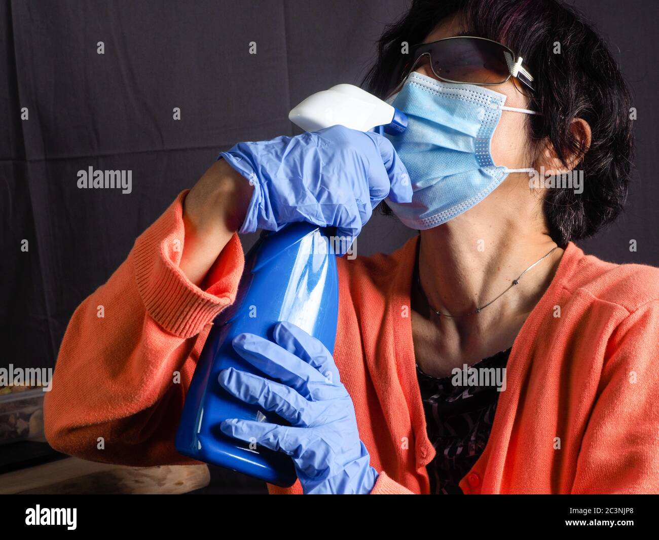 funny humorous adult asian 40s 50s woman wearing protection surgical ...