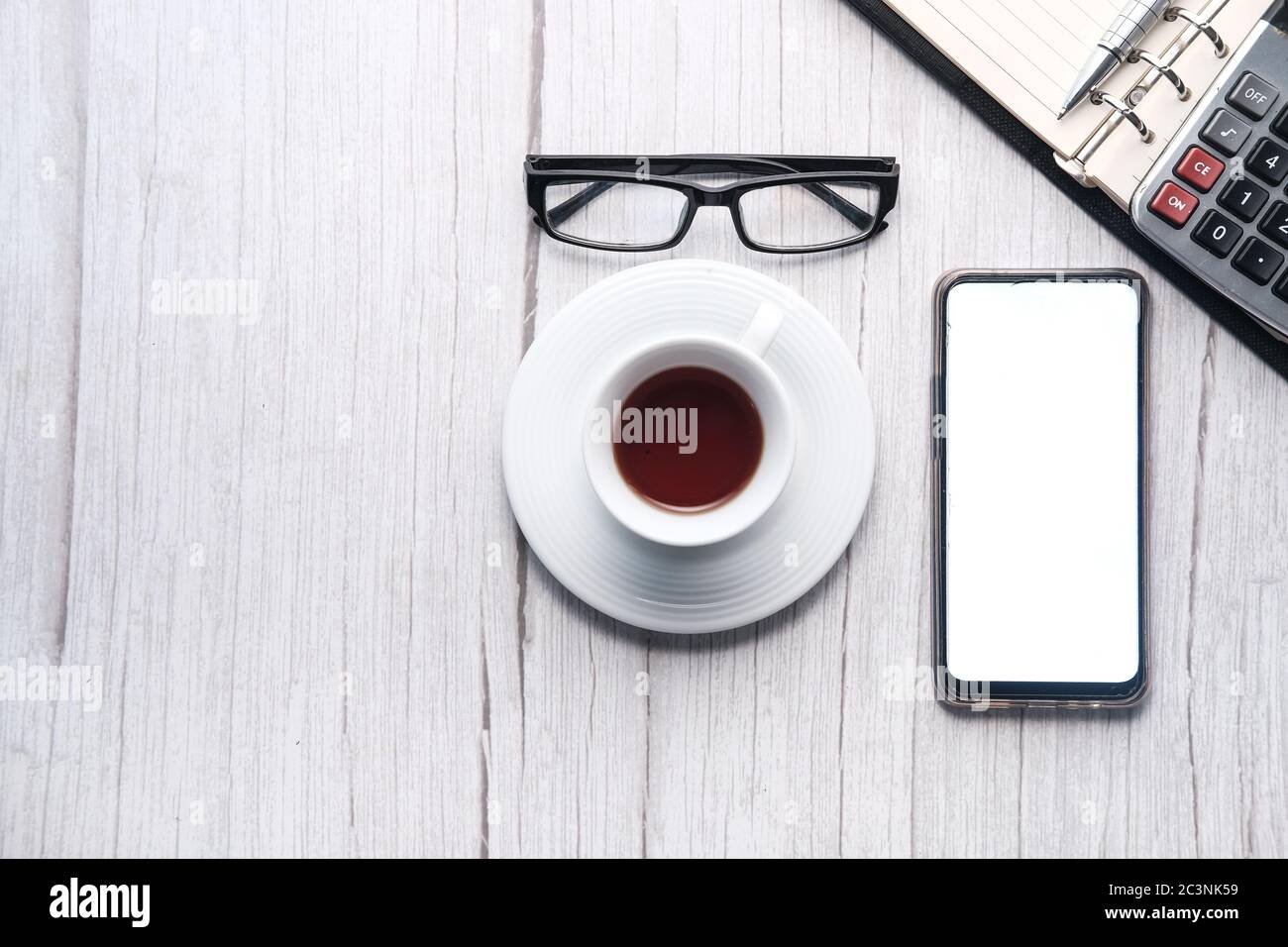 smart phone with empty screen on notepad Stock Photo - Alamy