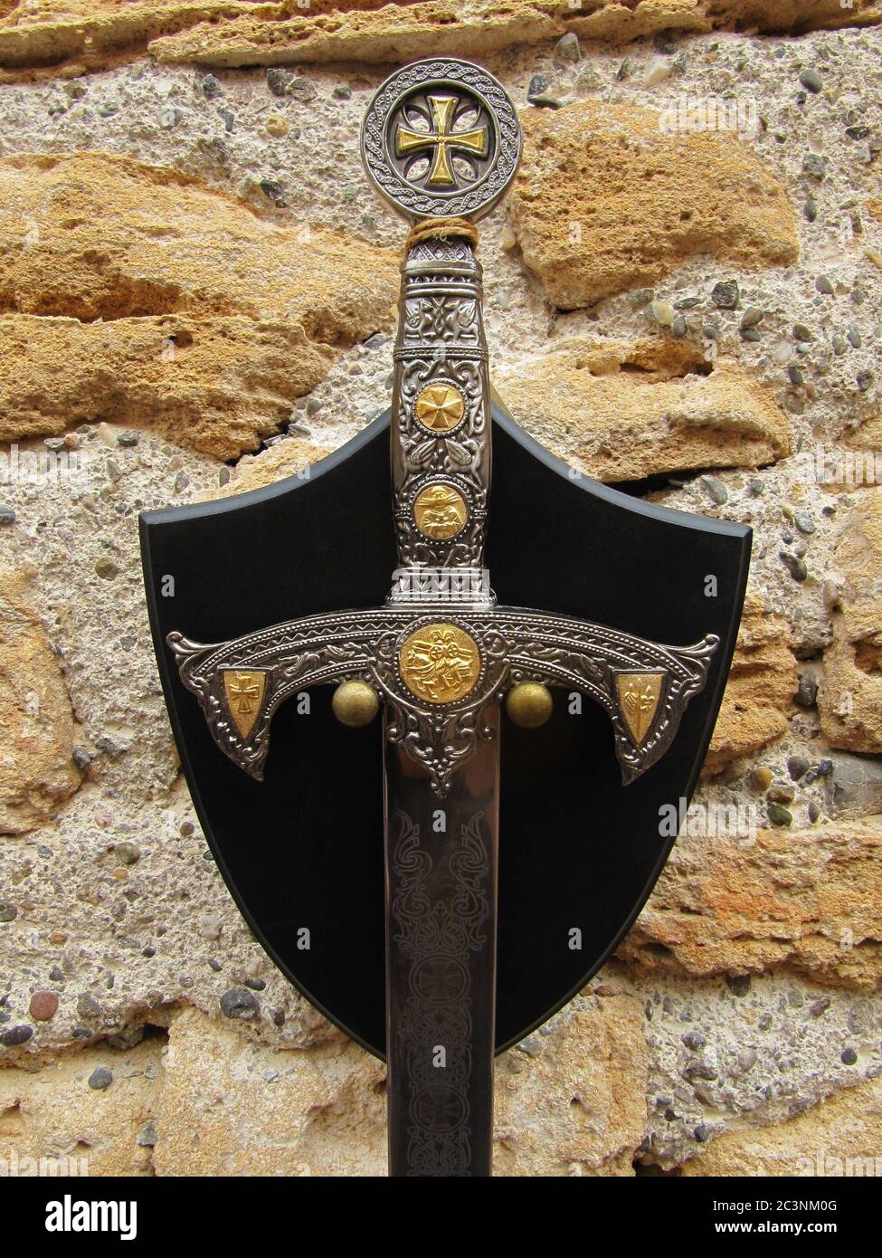 Templar sword hilt with wall bracket Stock Photo - Alamy