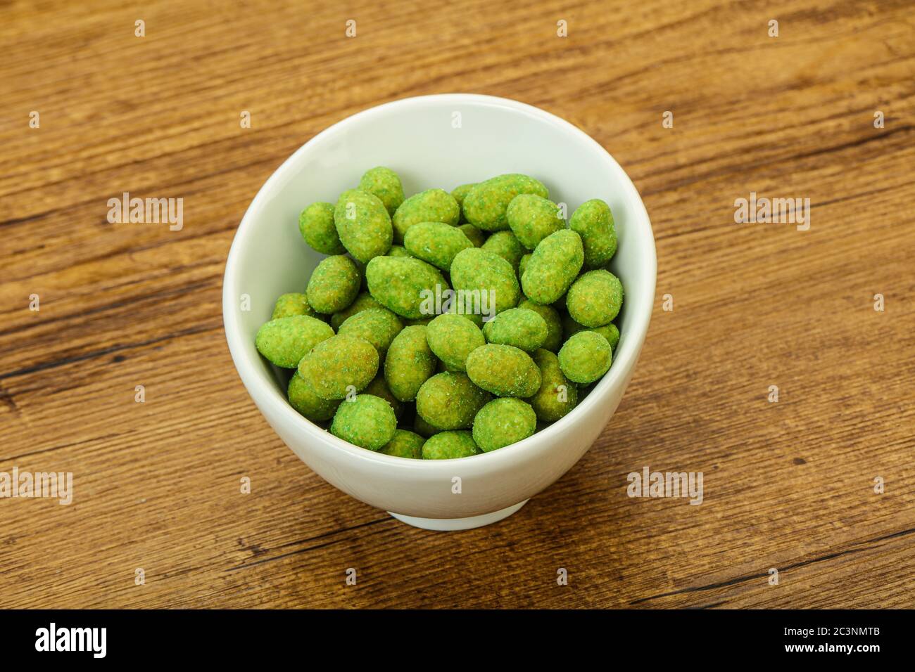 Spicy wasabi peanuts snack in the bowl Stock Photo - Alamy