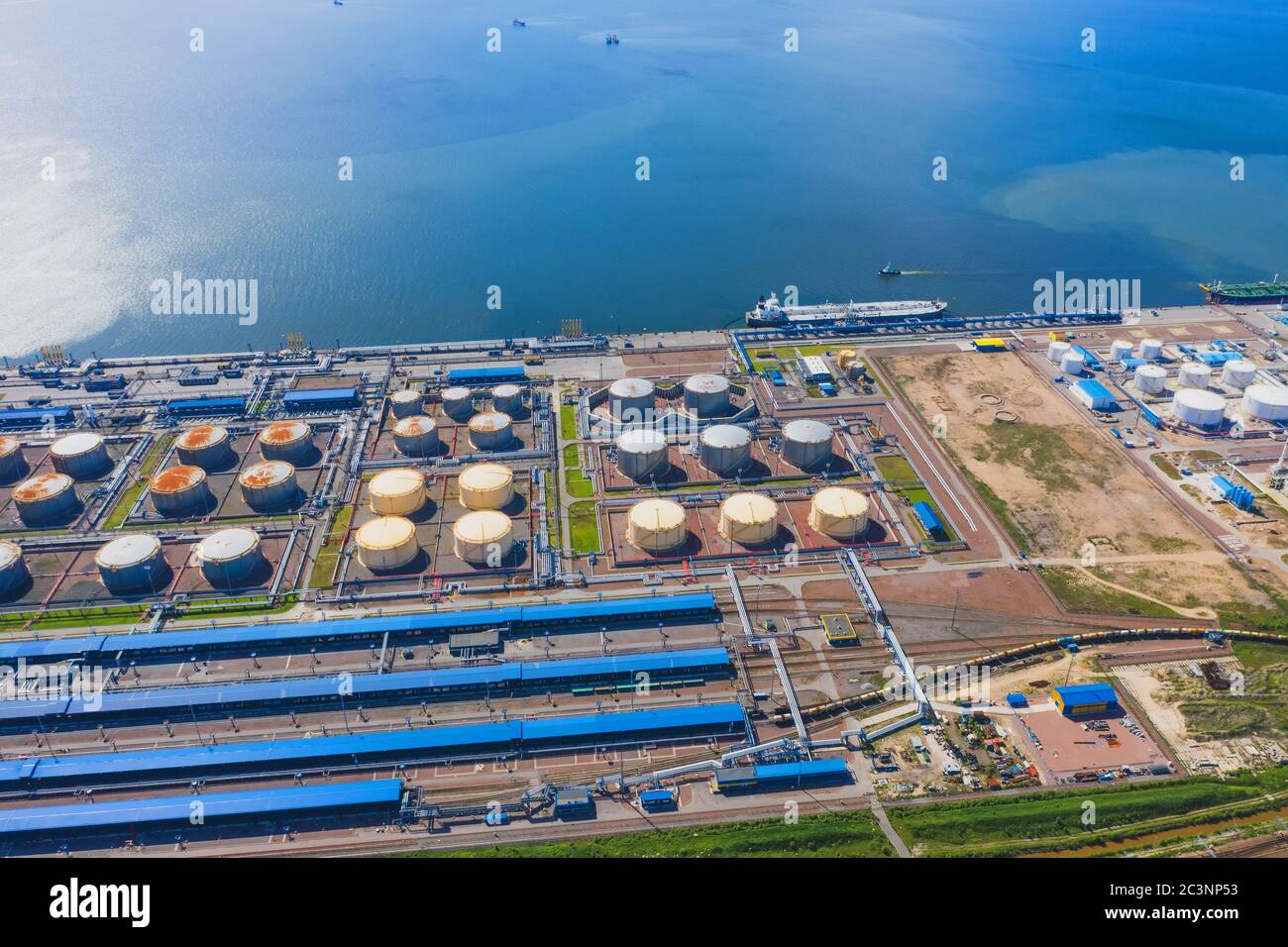 Huge port with oil tanks for storing liquid fuel on the seashore Stock ...