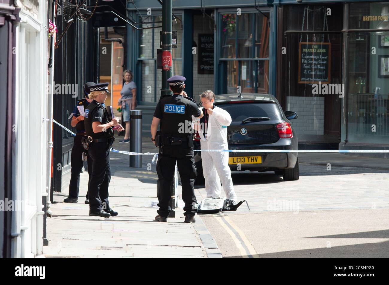 Police and forensics officers at the scene of a stabbing in Canterbury ...