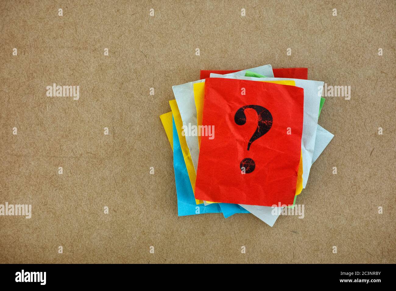 Pile of colorful paper notes with question marks. Closeup Stock Photo ...