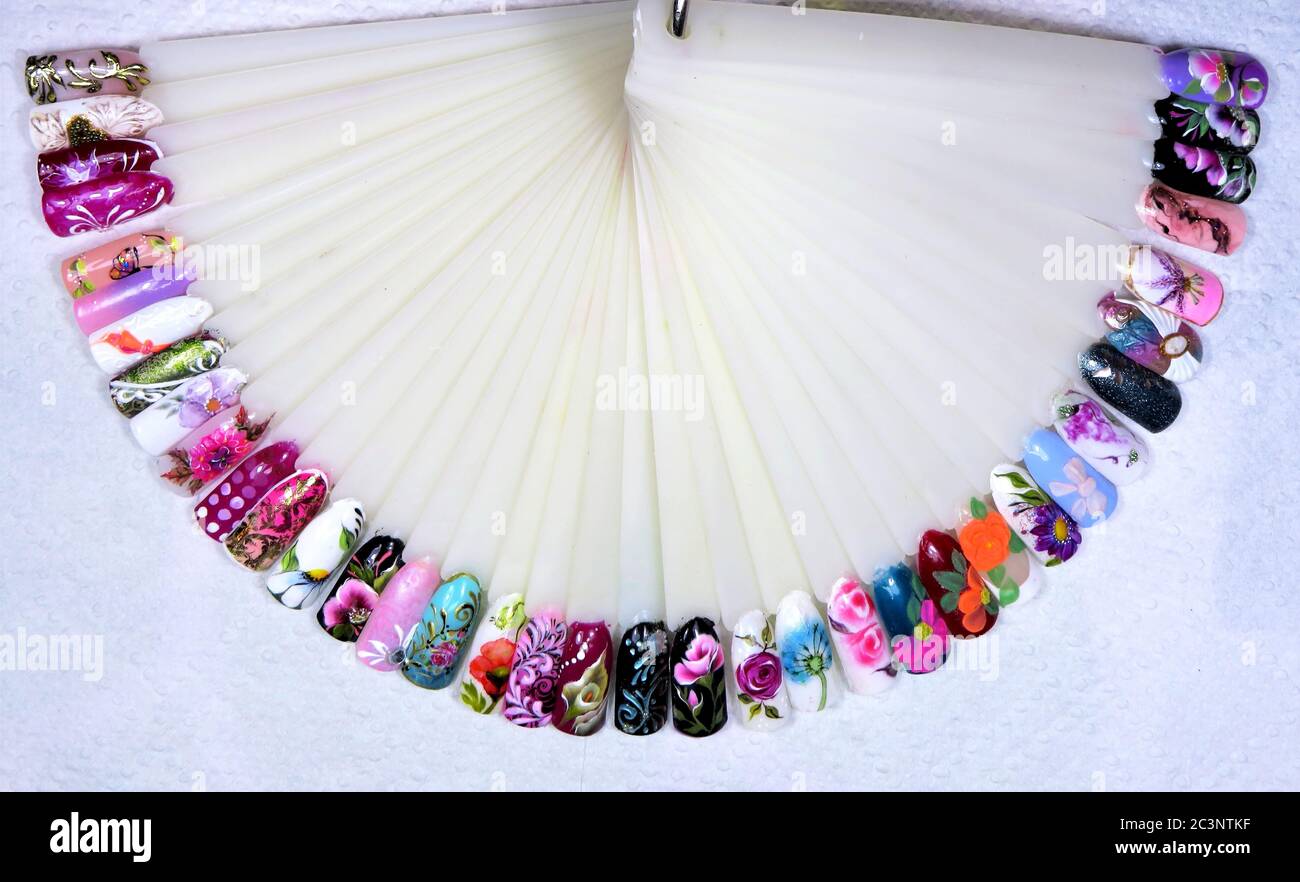 Samples of various fingernail designs isolated on a white background ...