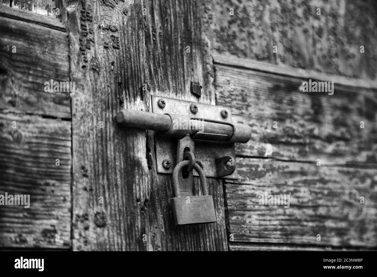 Broken wooden door with padlock, construction and architecture Stock ...