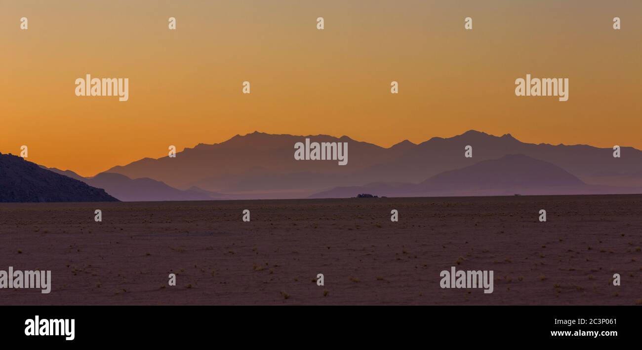 Distant mountains at sunset hi-res stock photography and images - Alamy
