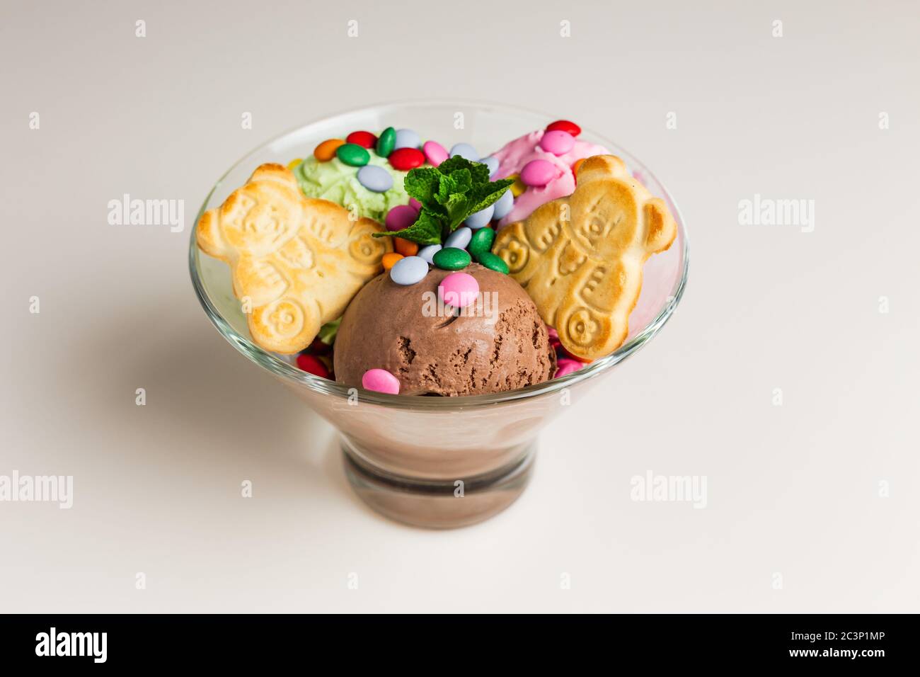 Funny colorful ice-cream for kids, chocolate, strawberry and pistachio ...
