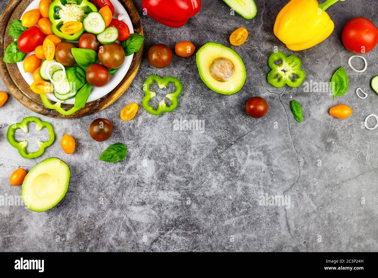 Tasty appetizing salad with tomatoes, cucumbers, peppers in bowl on ...