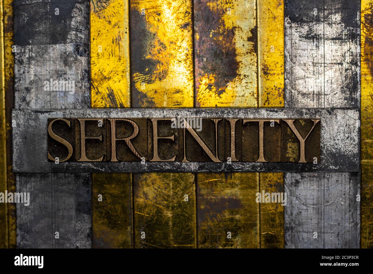 Serenity text formed with real authentic typeset letters on vintage ...