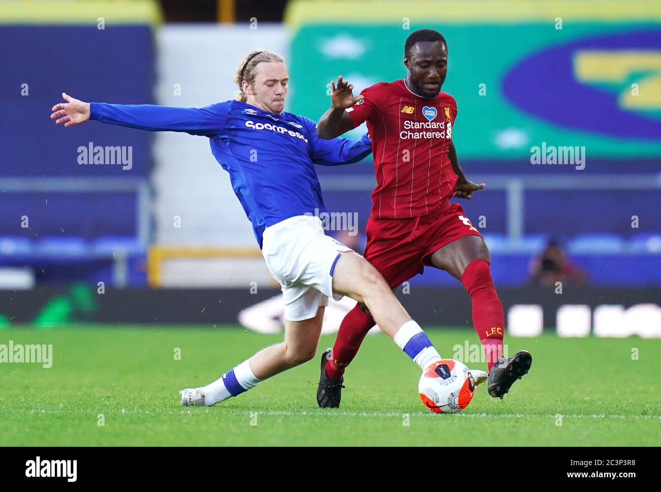 Everton's Tom Davies (left) and Liverpool's Naby Keita battle for the ...