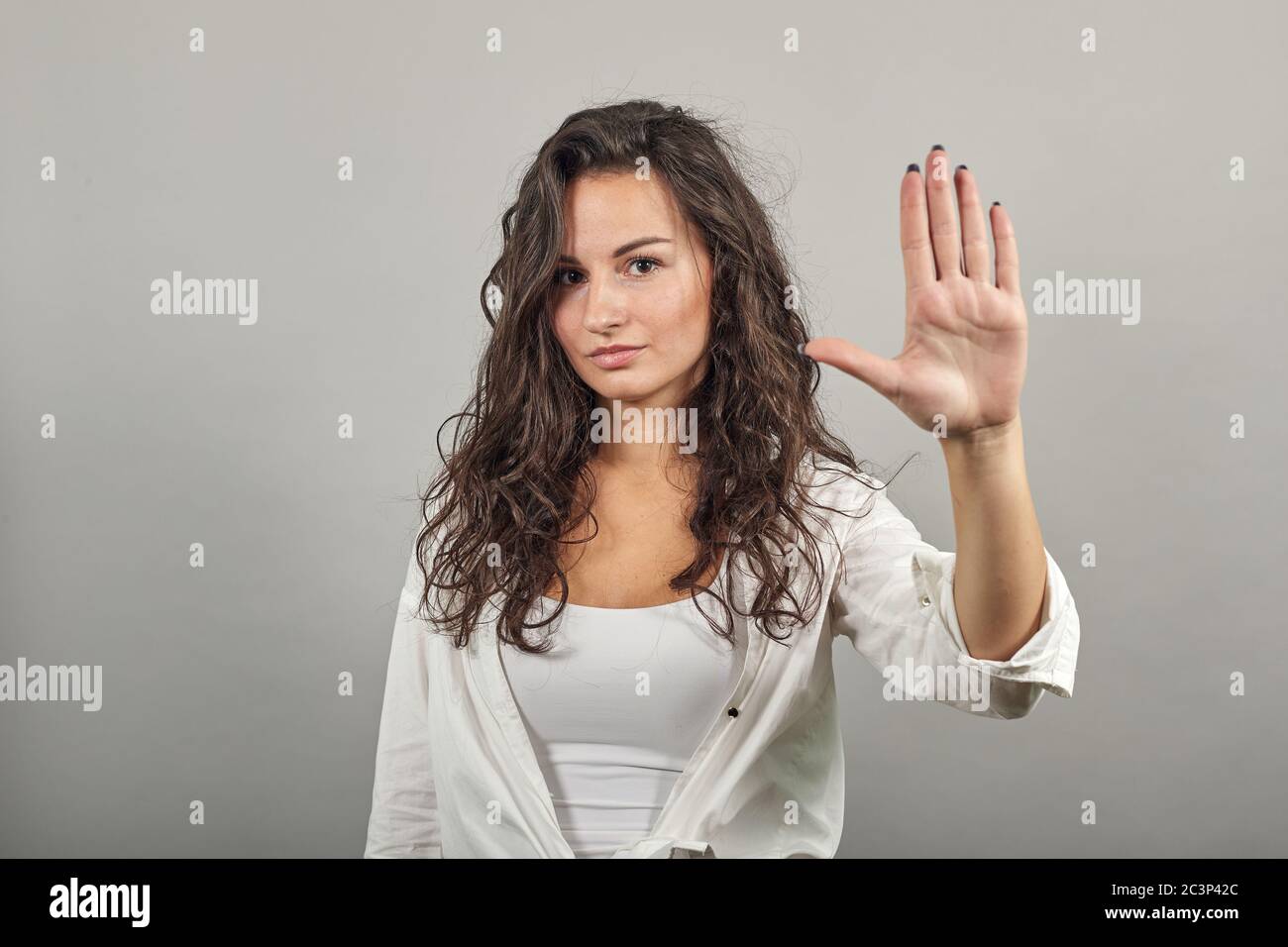 Palm arm raised air angry look straight you will not pass through ...