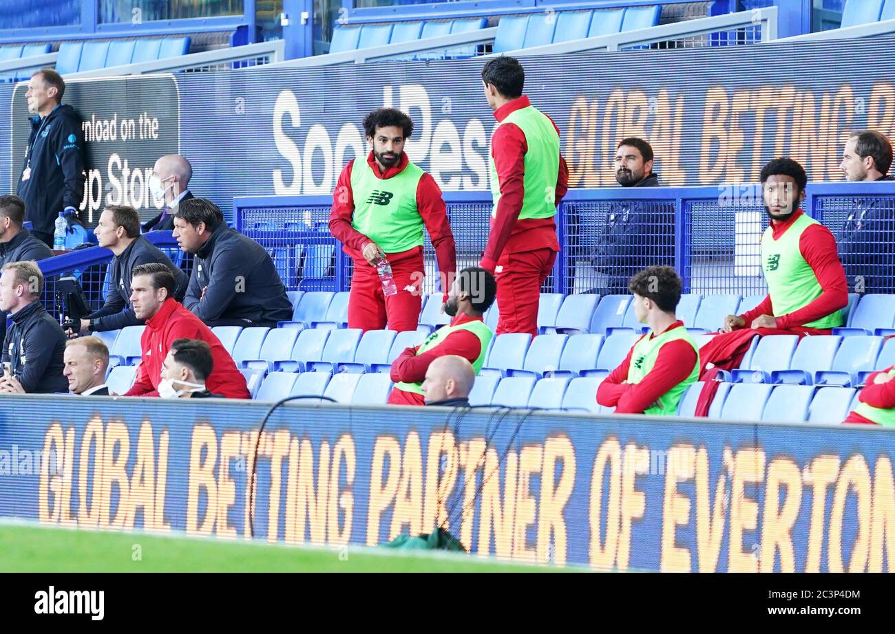 Liverpool's Mohamed Salah (centre left) on the bench during the Premier ...