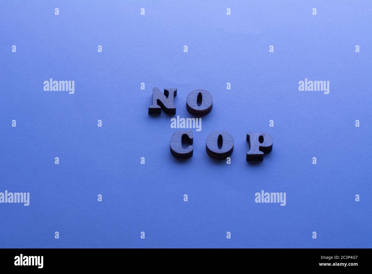 No cop sign flat lay on blue background with. Concept of Discrimination ...